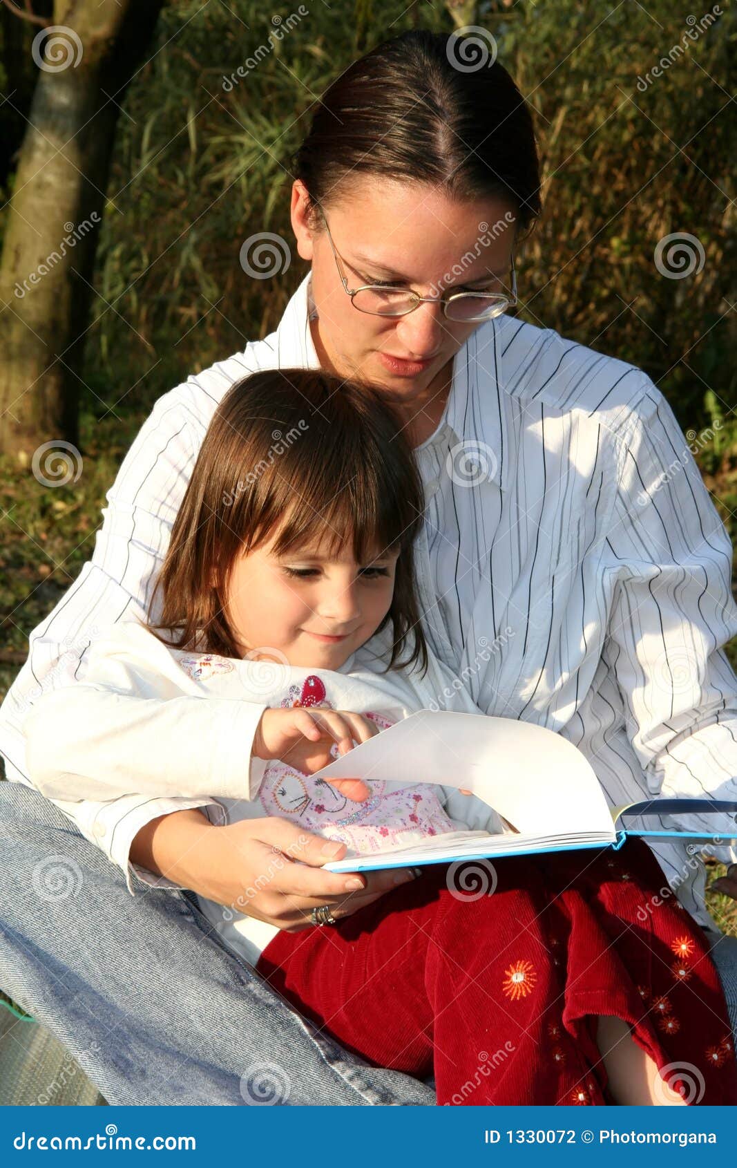 Mother and child reading stock photo. Image of education - 1330072