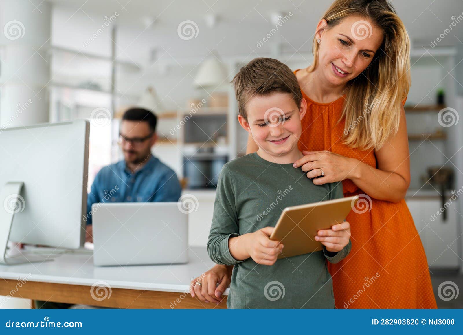 Mother and Child Using Digital Tablet for E-learning. Education Home ...