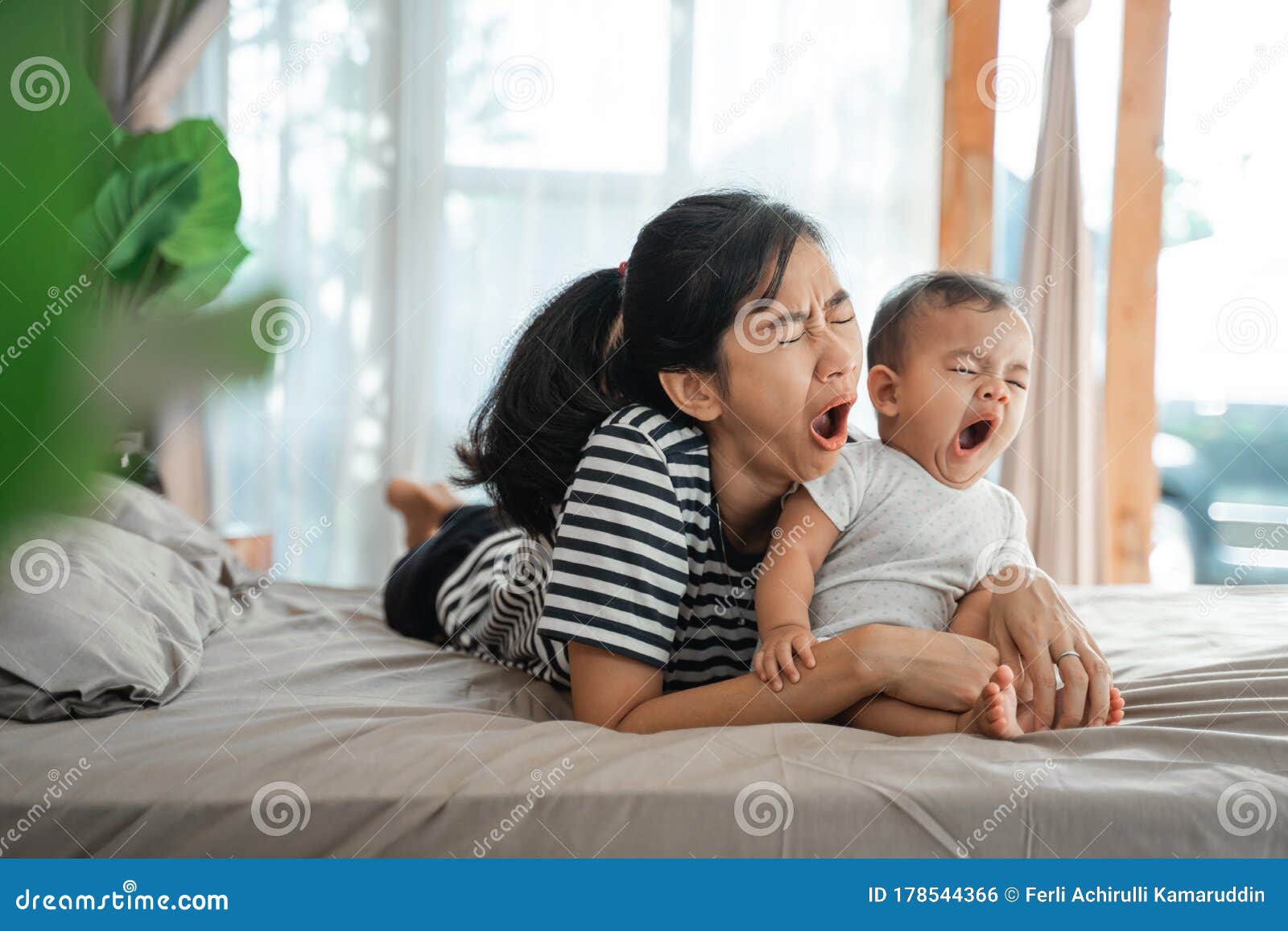 Mother and Child are Yawning Together Stock Photo - Image of female ...