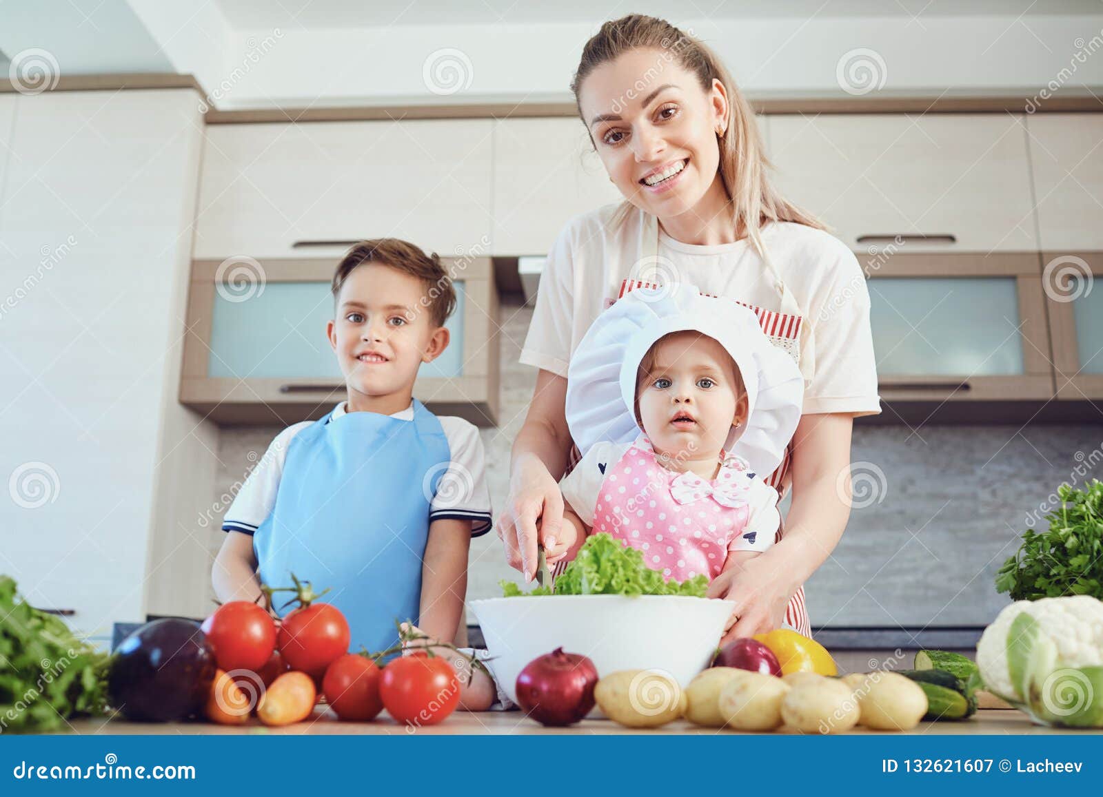 Mother and Children are Cooking in the Kitchen Stock Image - Image of ...