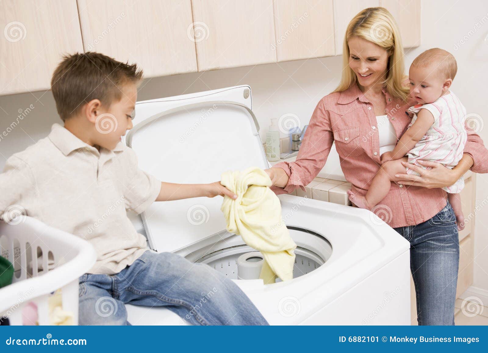 Mother and Children Doing Laundry Stock Image - Image of clothing ...