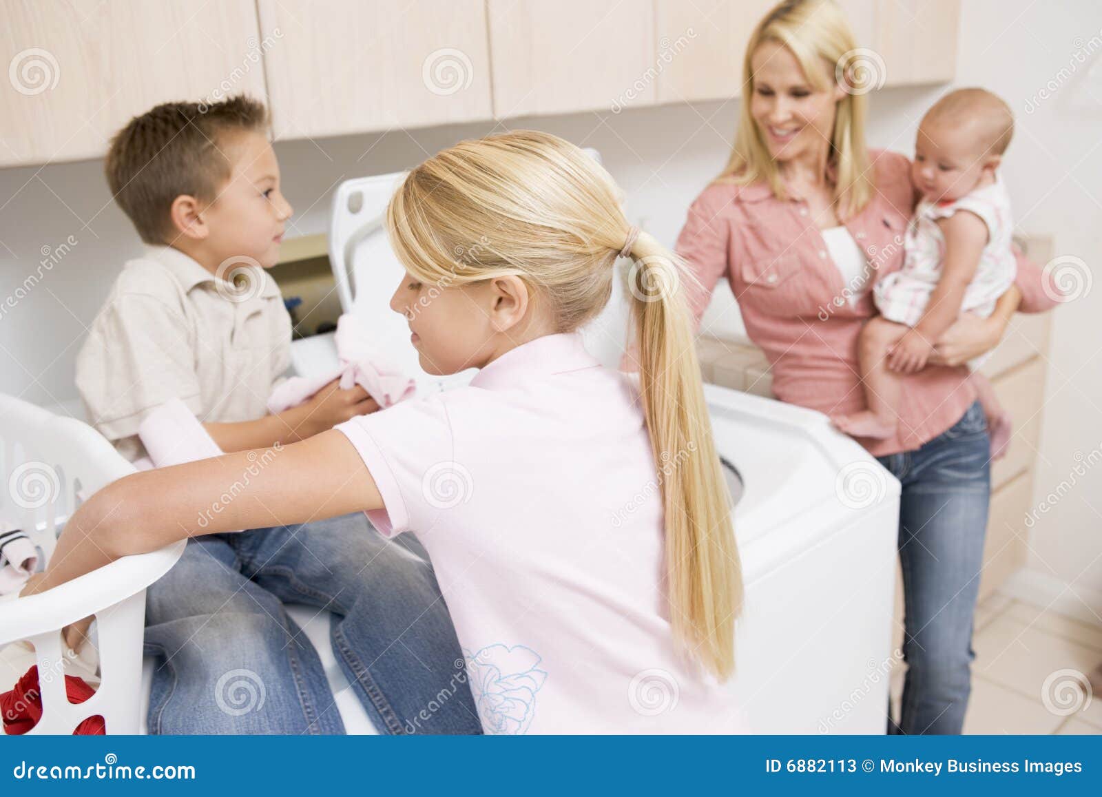 Mother and Children Doing Laundry Stock Image - Image of teamwork ...