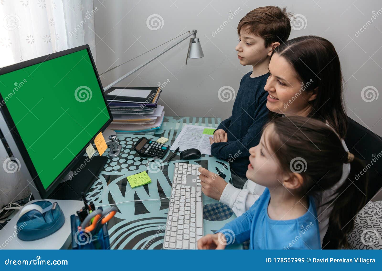 Mother and Children Looking at Computer Screen Stock Image - Image of ...