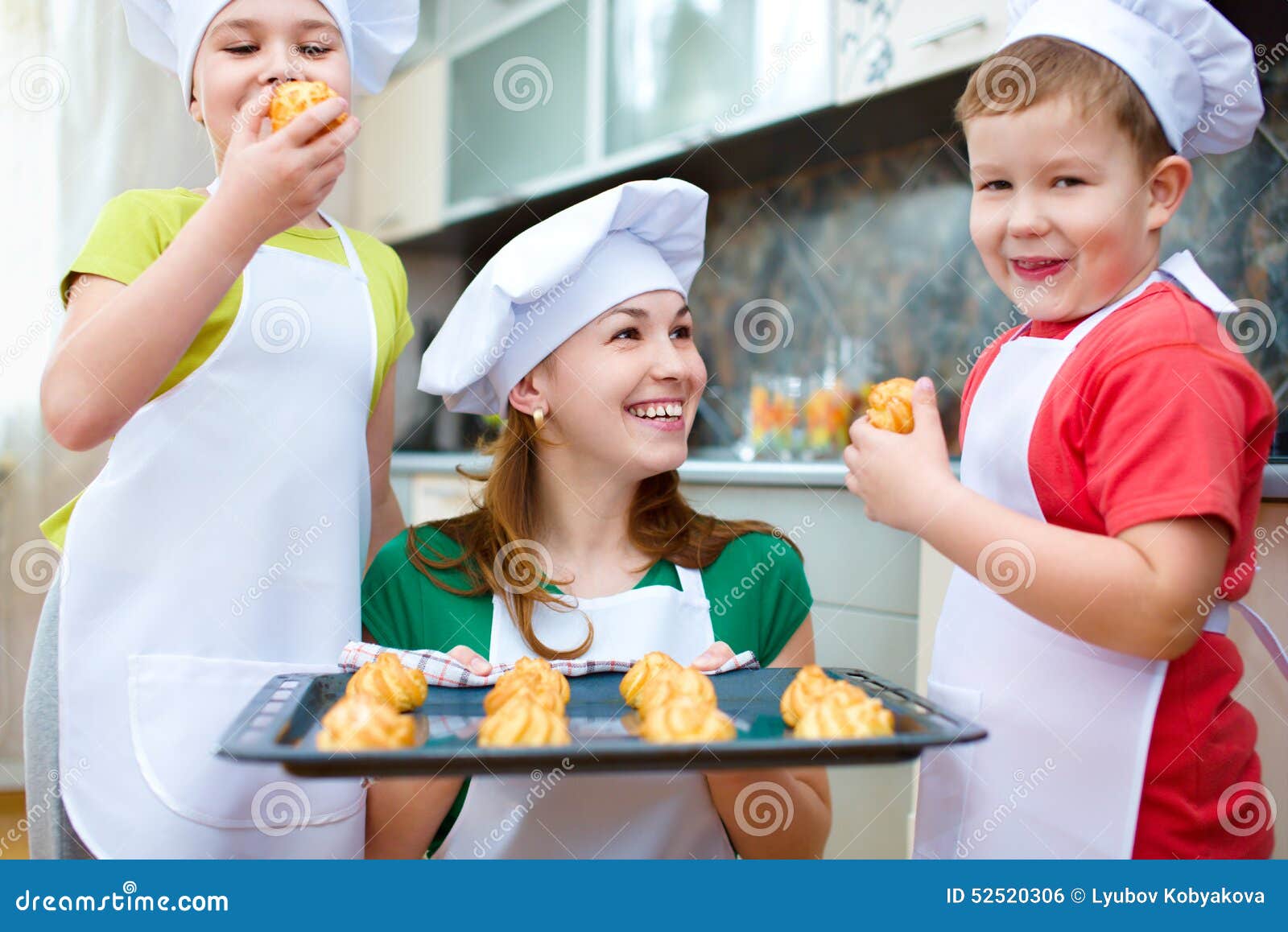 Mother with Children Making Bread Stock Photo - Image of happiness ...