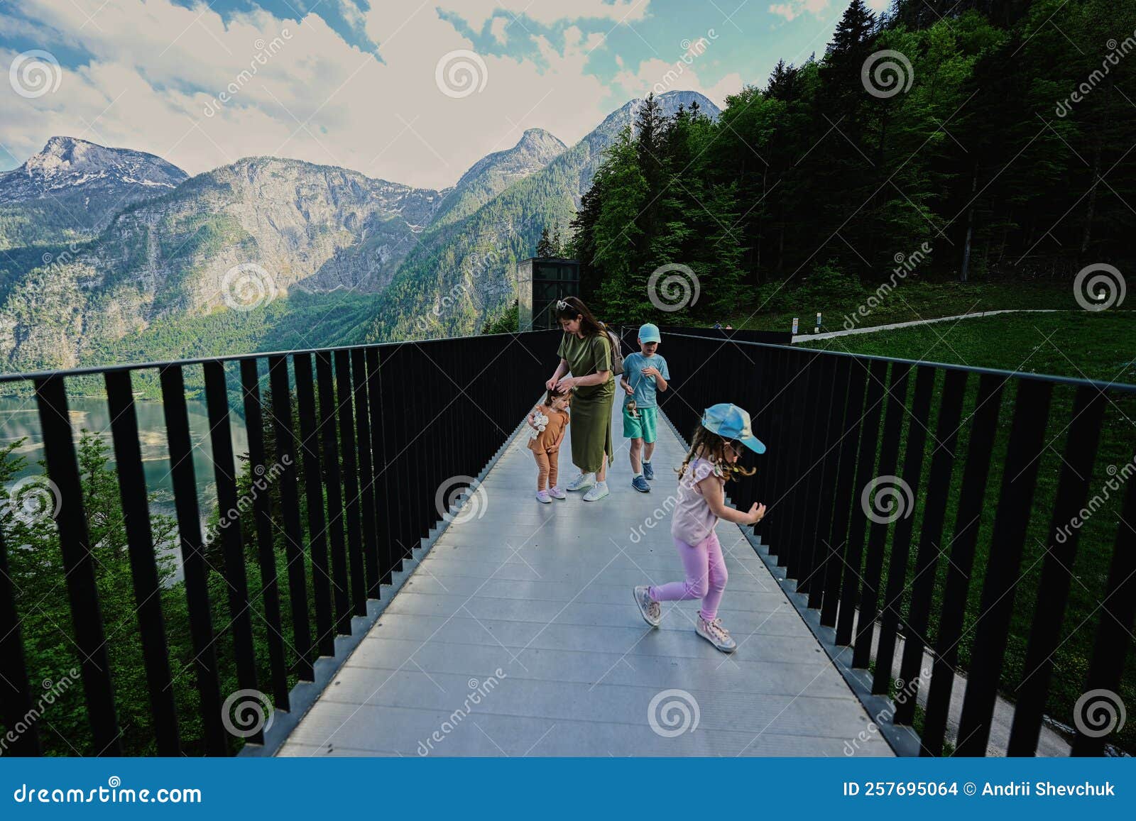 Mother with Children at Observation Bridge in Hallstatt, Austria Stock ...