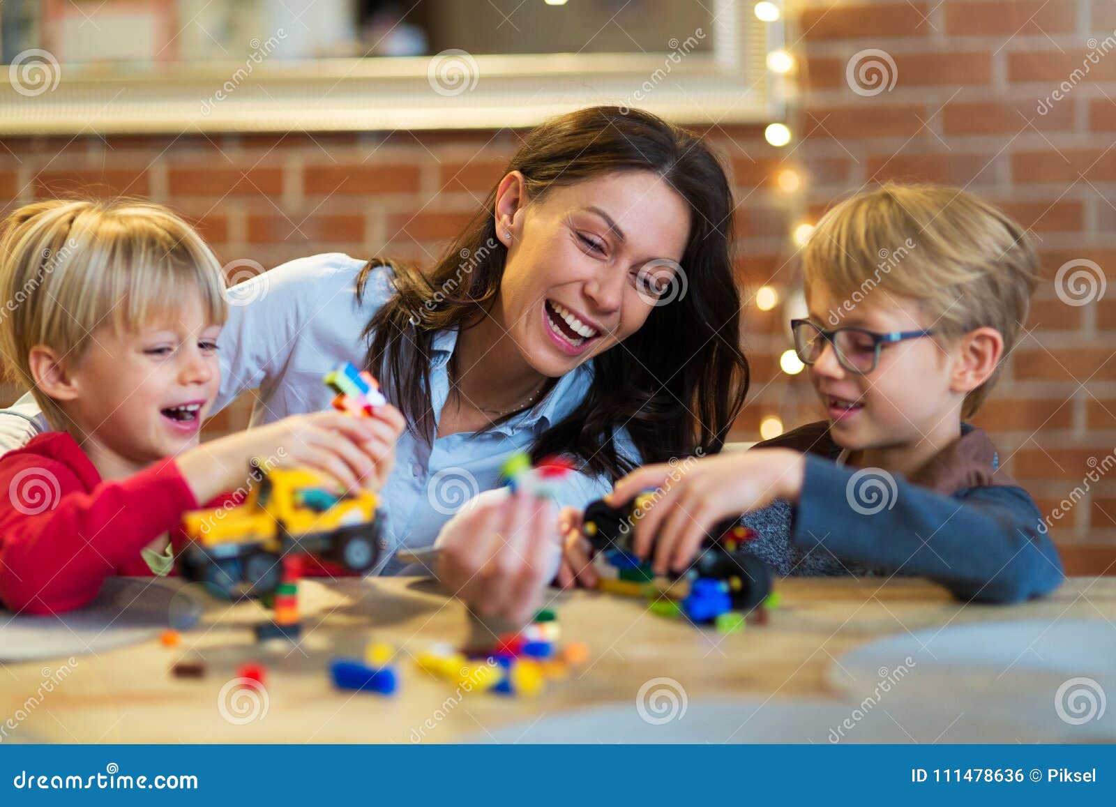 Mother and Children Playing with Blocks Stock Photo - Image of enjoying ...