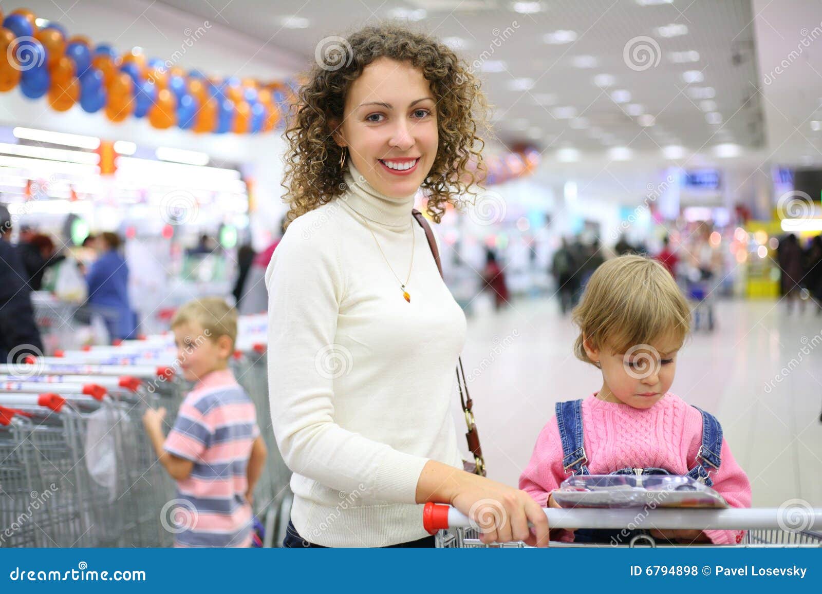 Mother with Children in Shop Stock Photo - Image of pretty, buying: 6794898