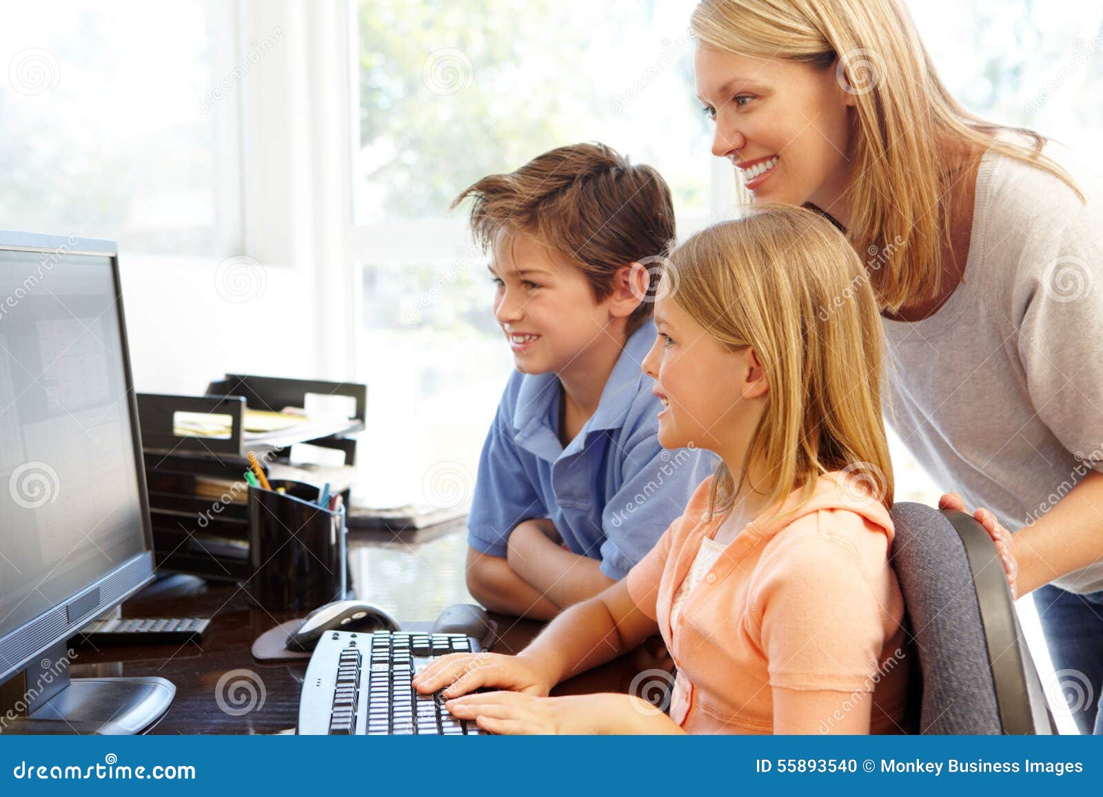 Mother and Children Using Computer at Home Stock Photo - Image of ...