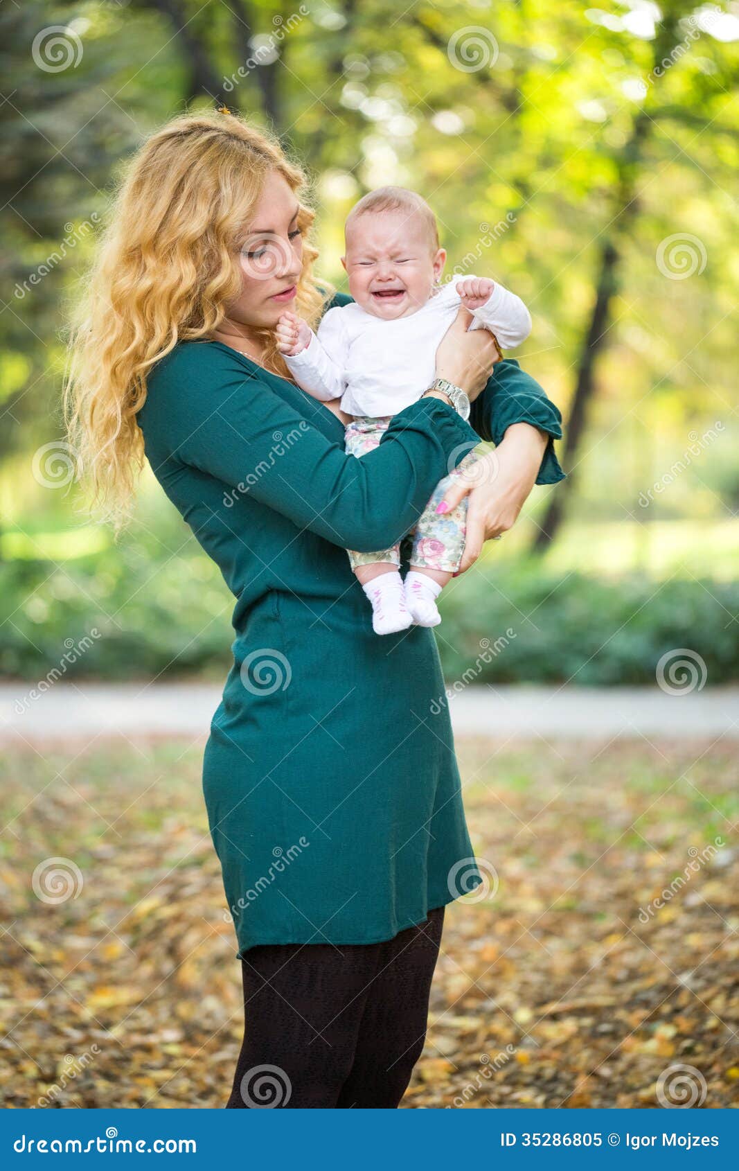 Mother console her baby stock image. Image of adorable - 35286805
