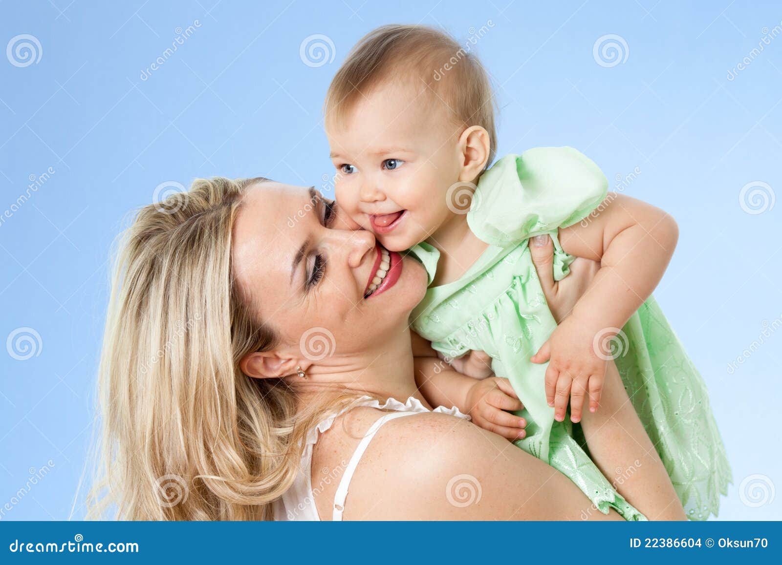Mother with Cute Baby Looking Over Shoulder Stock Photo - Image of ...