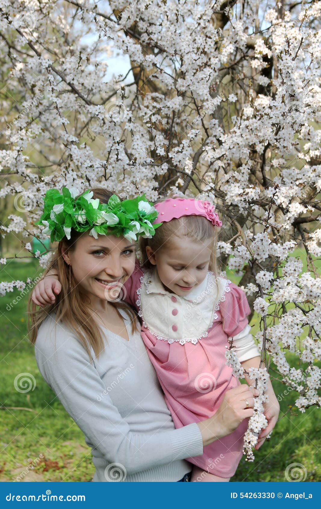 Mother and Daughter Admiring Spring Tree Stock Photo - Image of park ...
