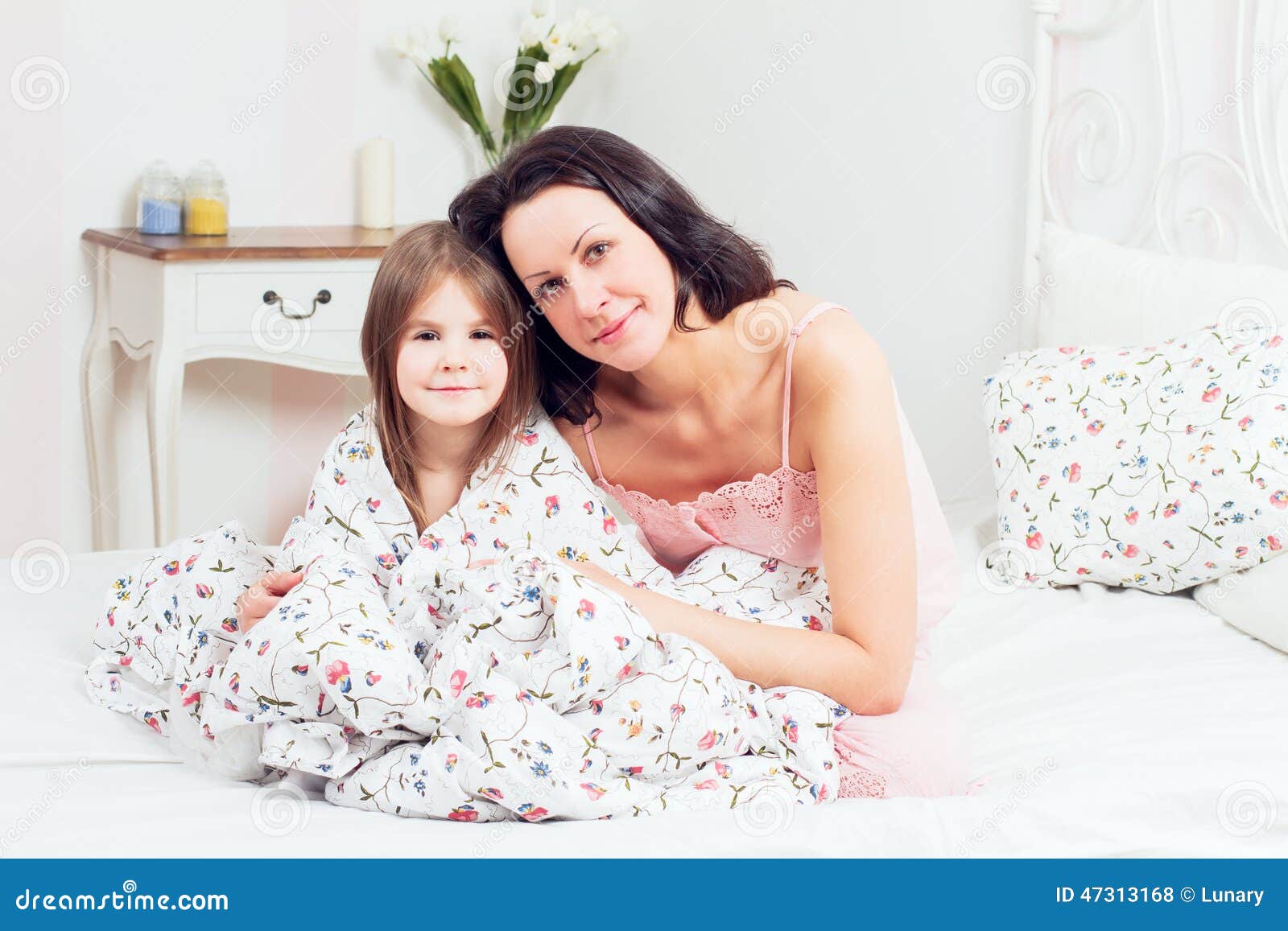 Mother and daughter in bad stock photo. Image of funny - 47313168