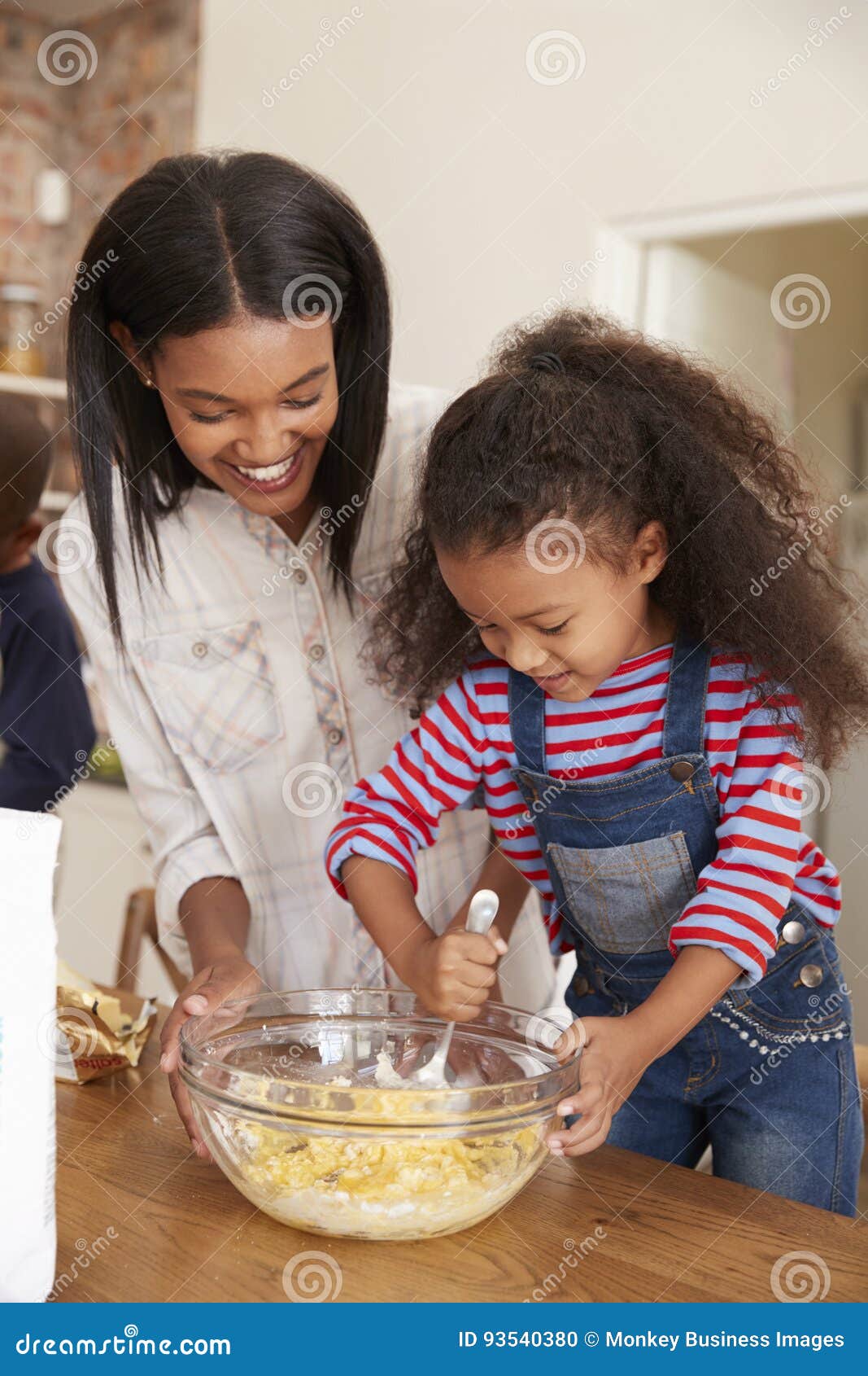 Mother and Daughter Baking Cakes in Kitchen Together Stock Photo ...
