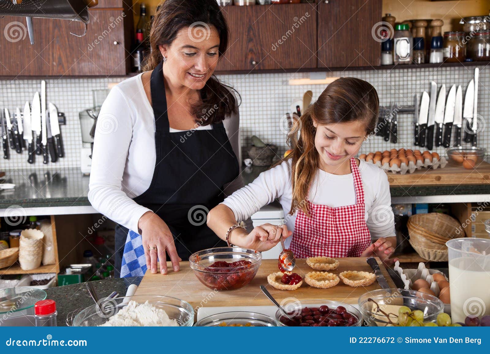 Mother and Daughter Baking at Home Stock Photo - Image of cheerful ...