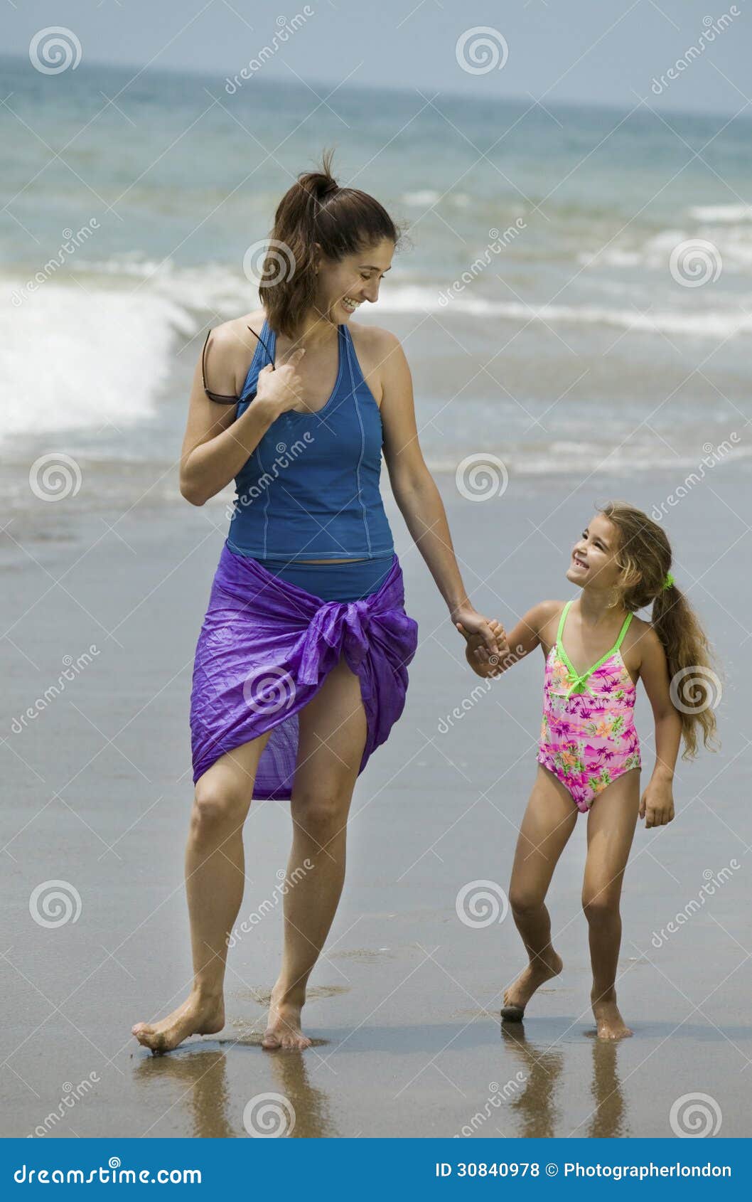 Mother and Daughter at the Beach Stock Photo - Image of years, children ... Mother and Daughter at the Beach Stock Photo - Image of years, children ...