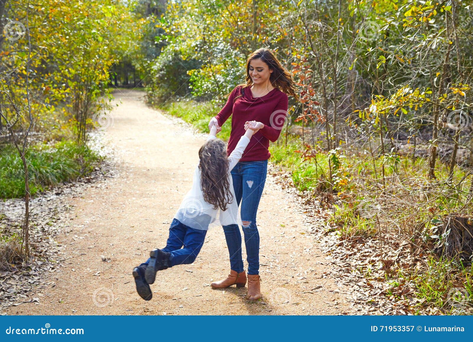 Mother and Daughter Being Spun in Circles Stock Image - Image of hands ...