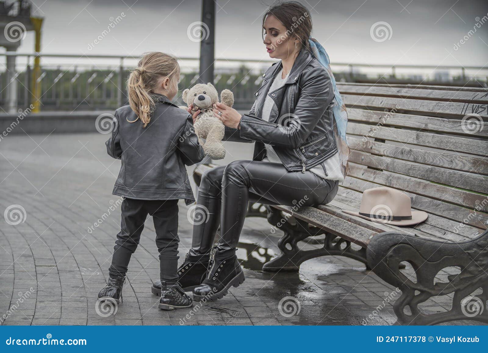 Mother and Daughter on a Bench Stock Photo - Image of consumers, city ...