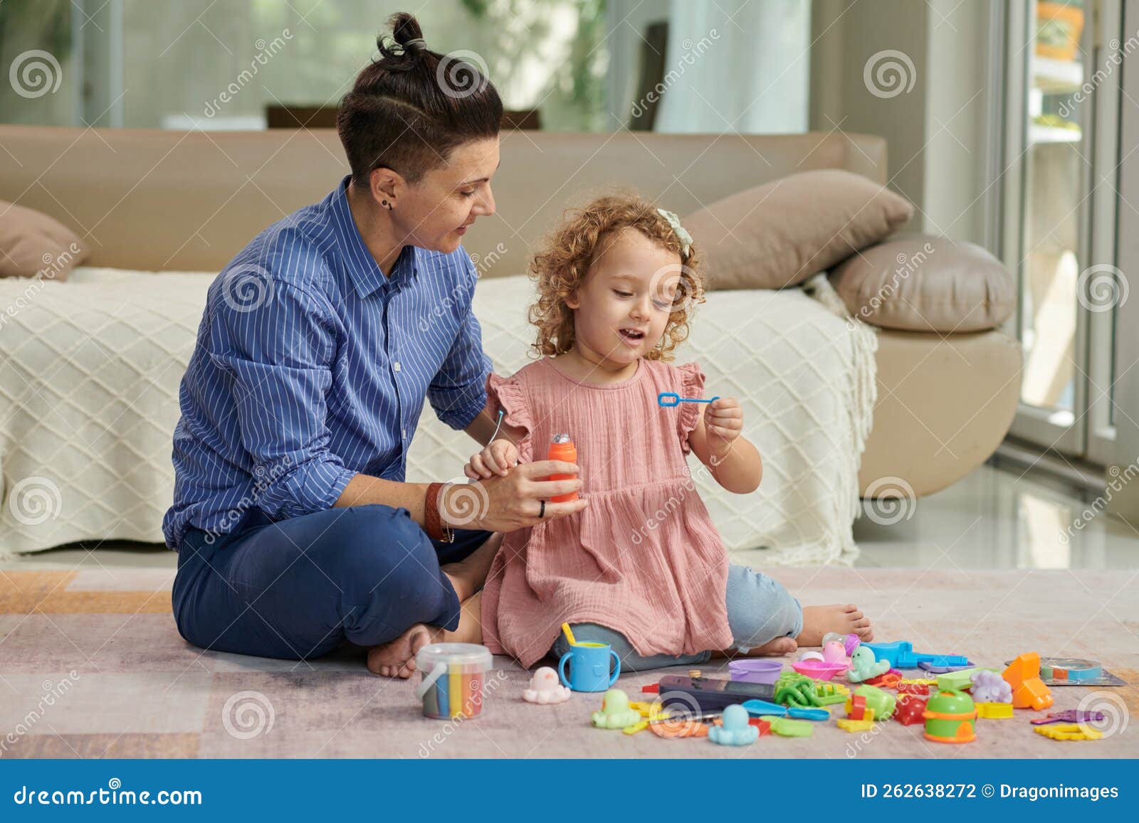 Mother and Daughter Blowing Soap Bubbles Stock Photo - Image of weekend ...