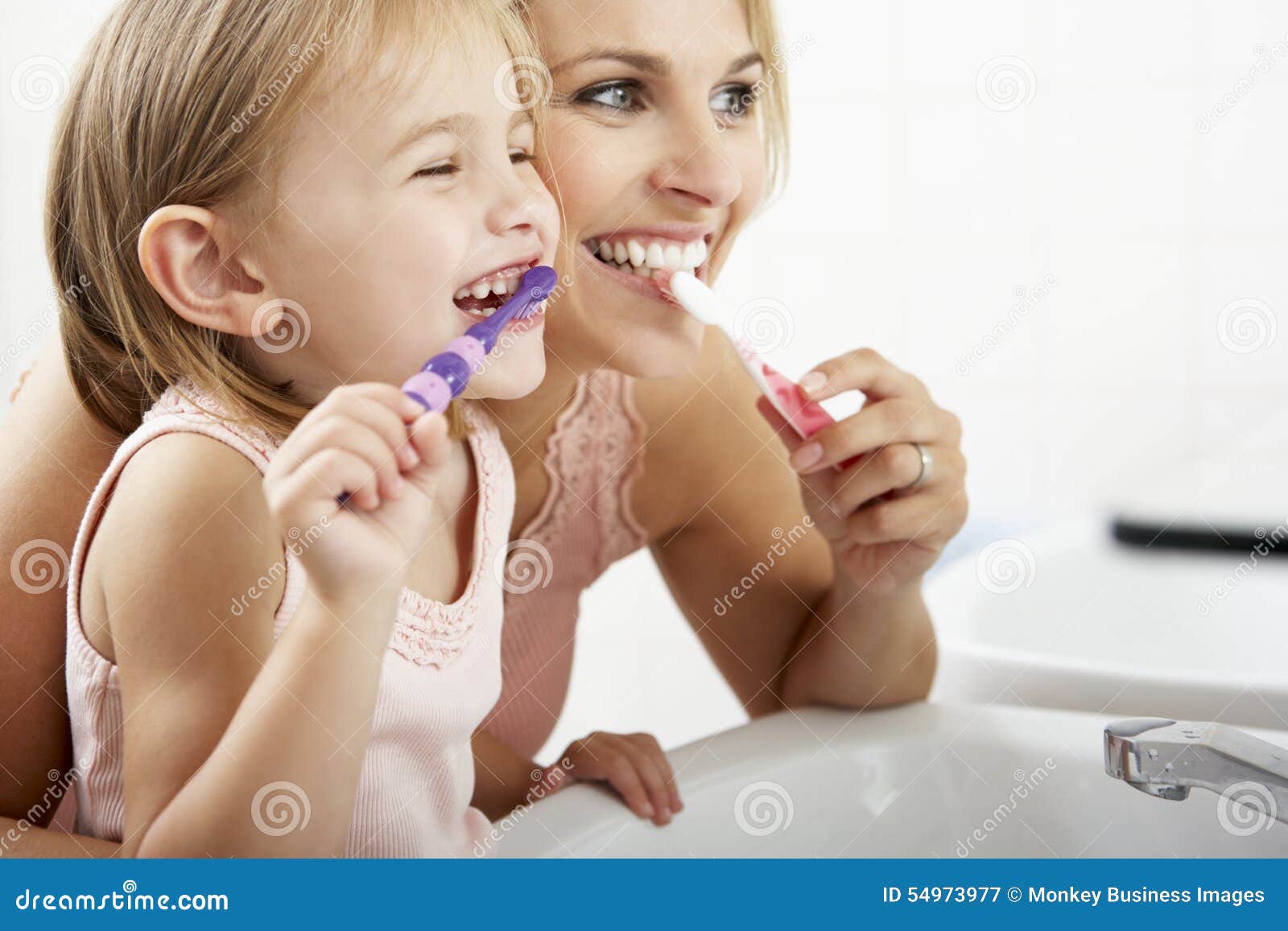 Mother and Daughter Brushing Teeth Together Stock Image - Image of ...