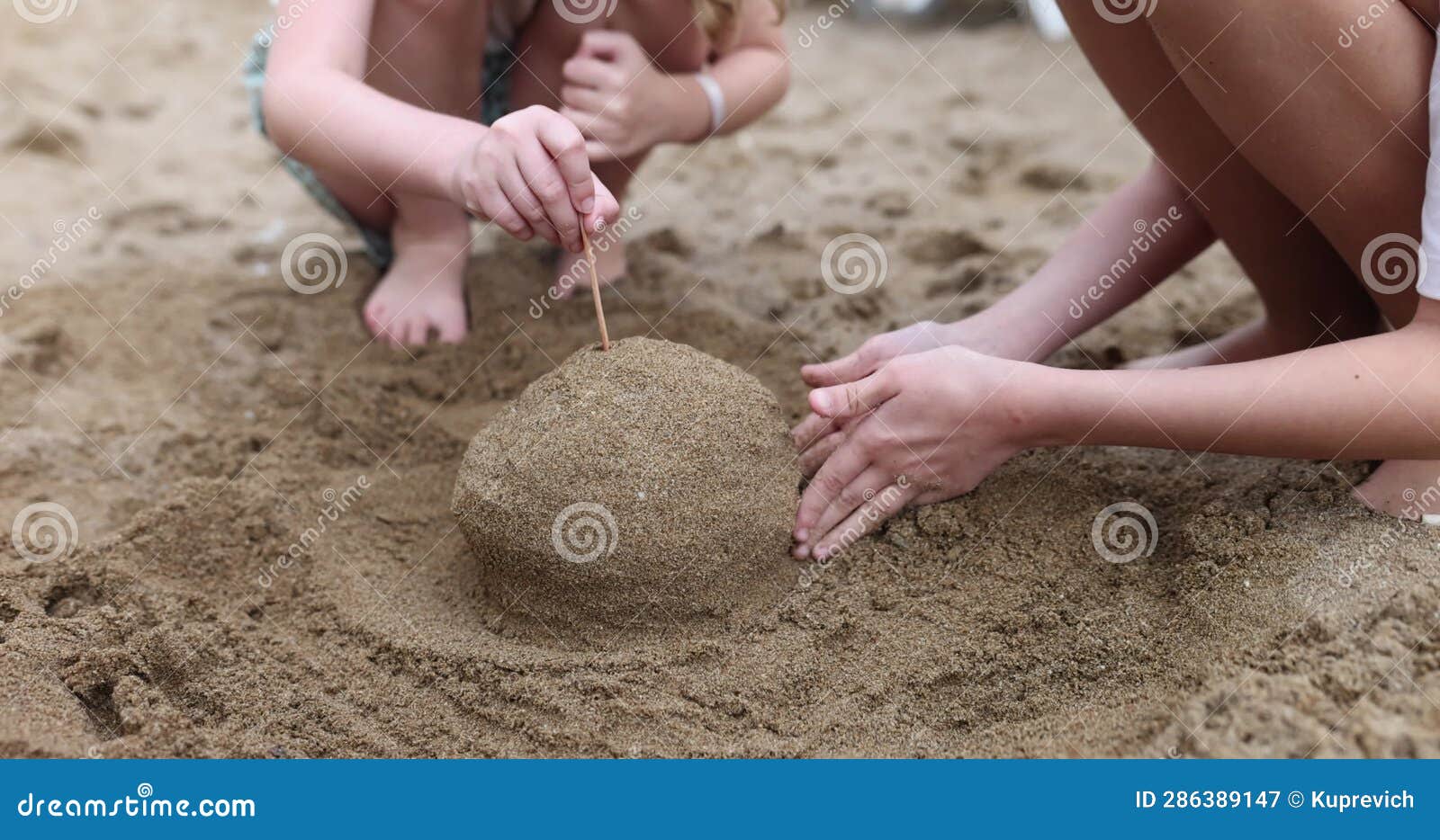 Mother and Daughter Build Structure from Sand on Beach Stock Video ...