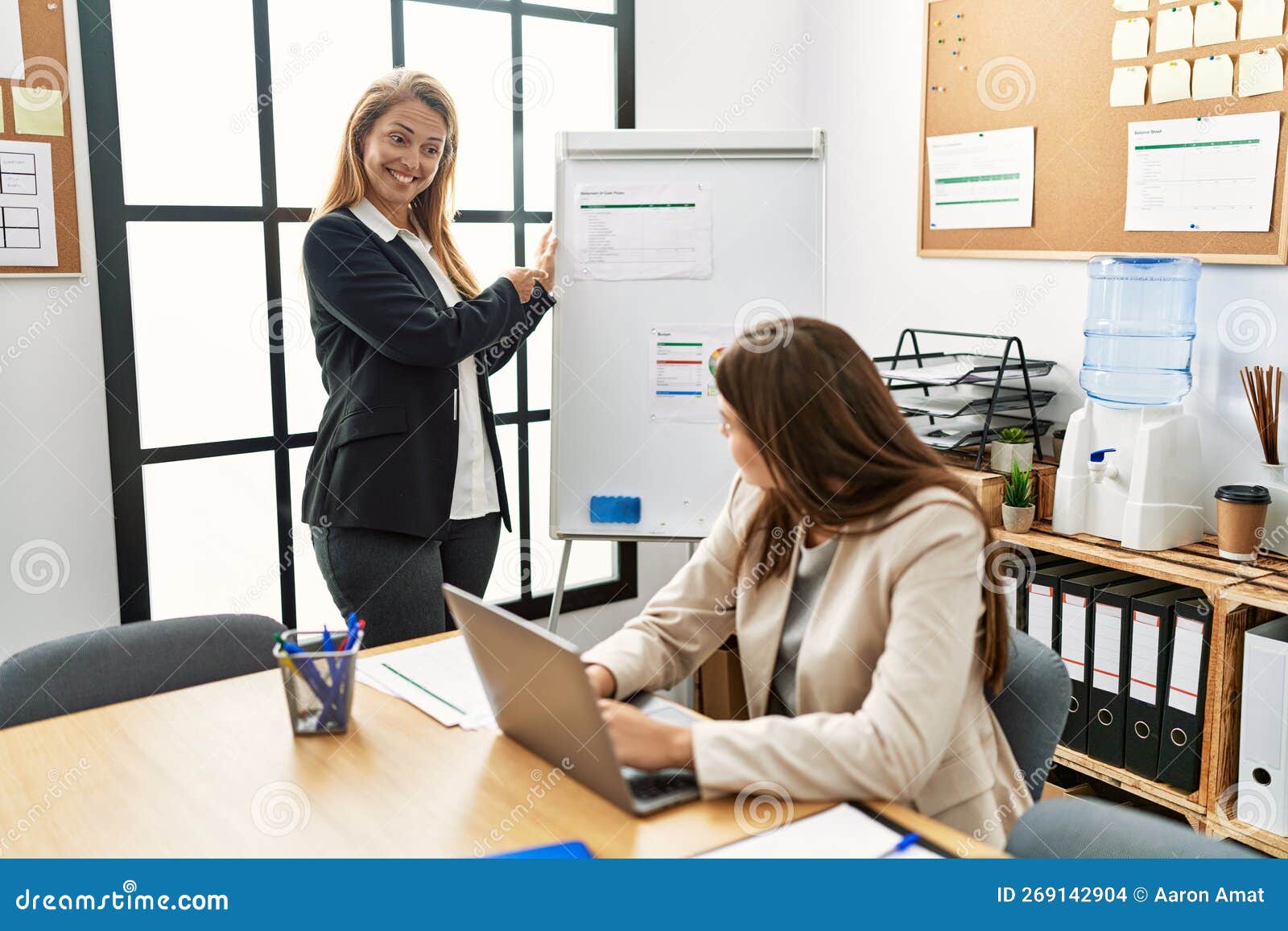 Mother and Daughter Business Workers Smiling Confident Explaning ...