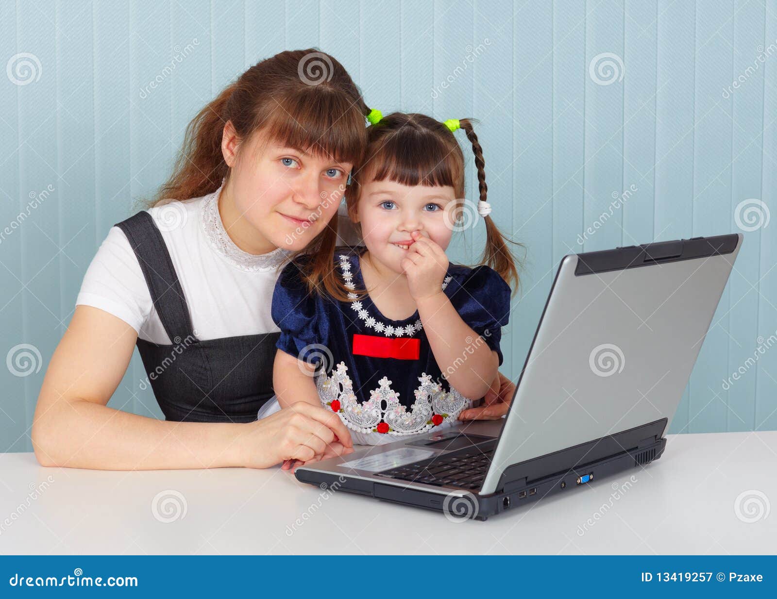 Mother and Daughter with Computer Stock Image - Image of fingers, young ...