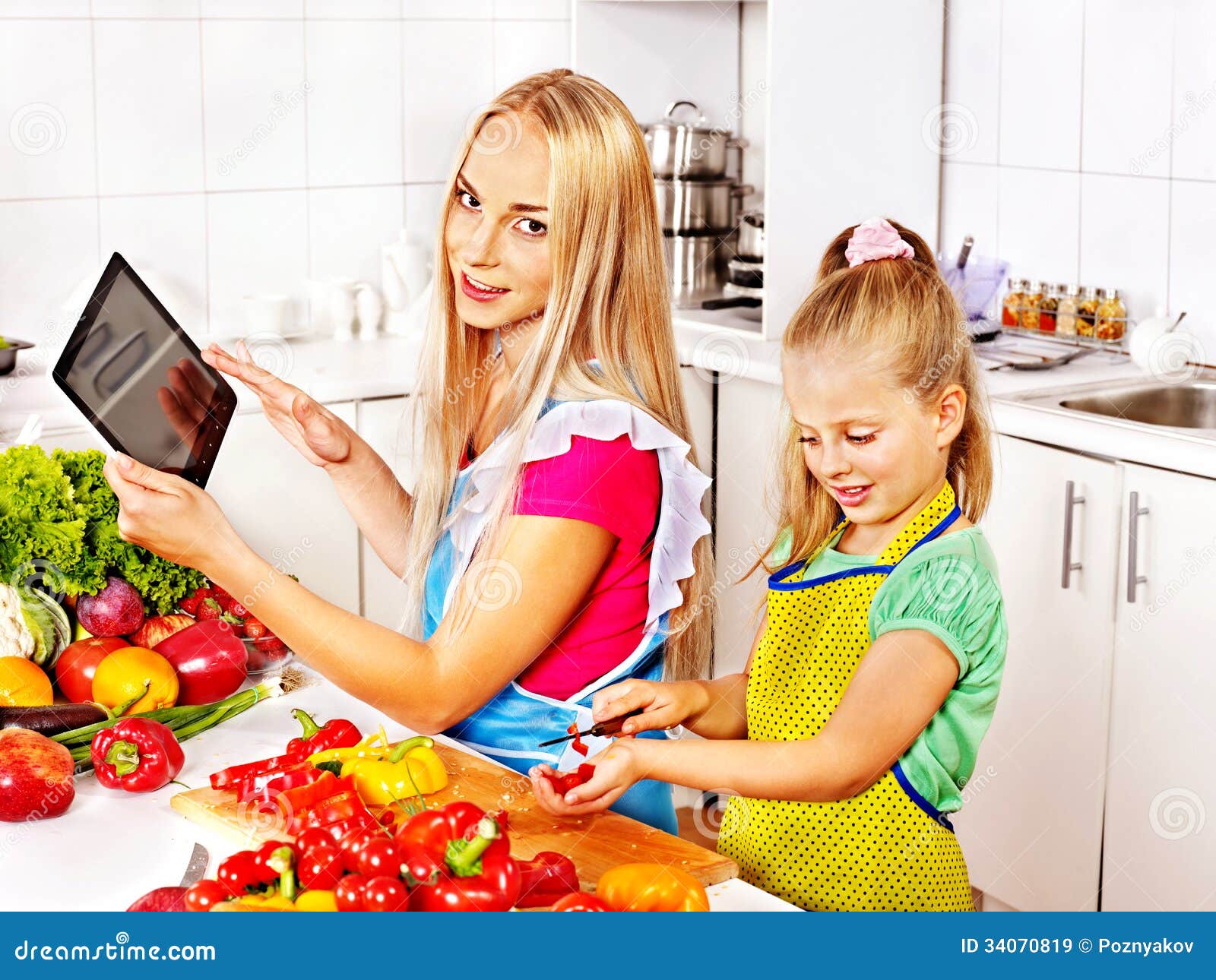 Mother and Daughter Cooking at Kitchen. Stock Image - Image of interior ...