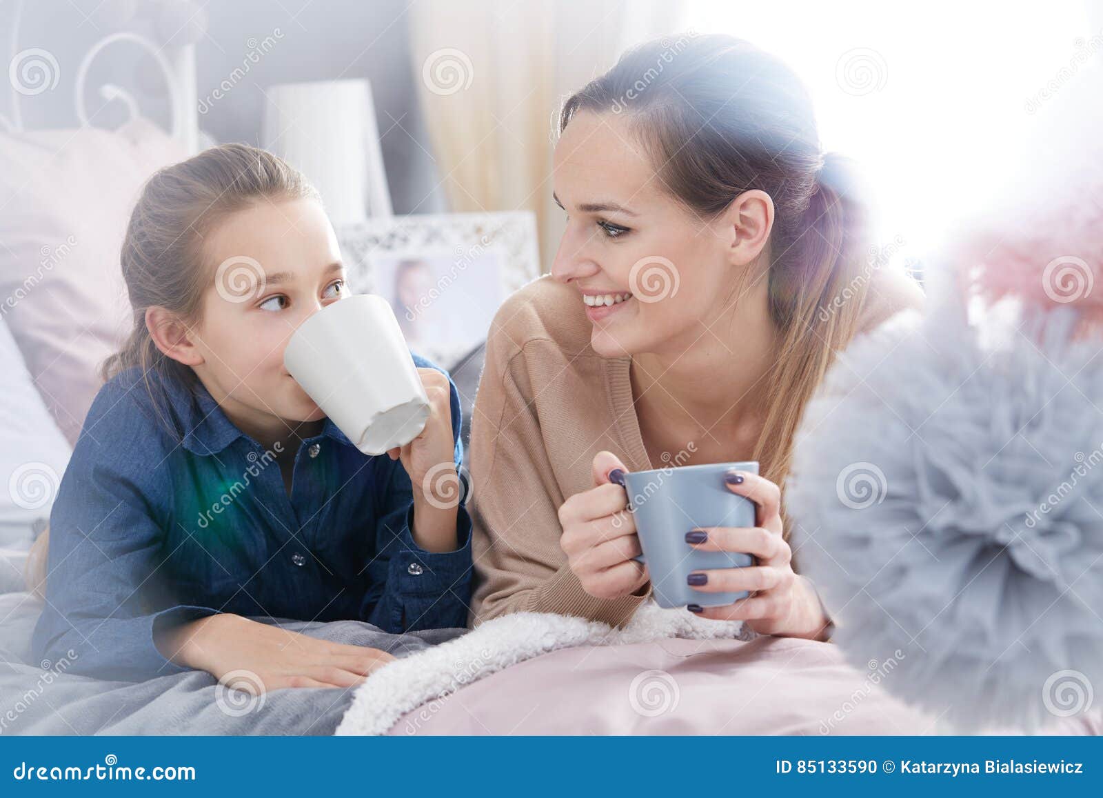 Mother and Daughter with Cups Stock Photo - Image of confidences ...