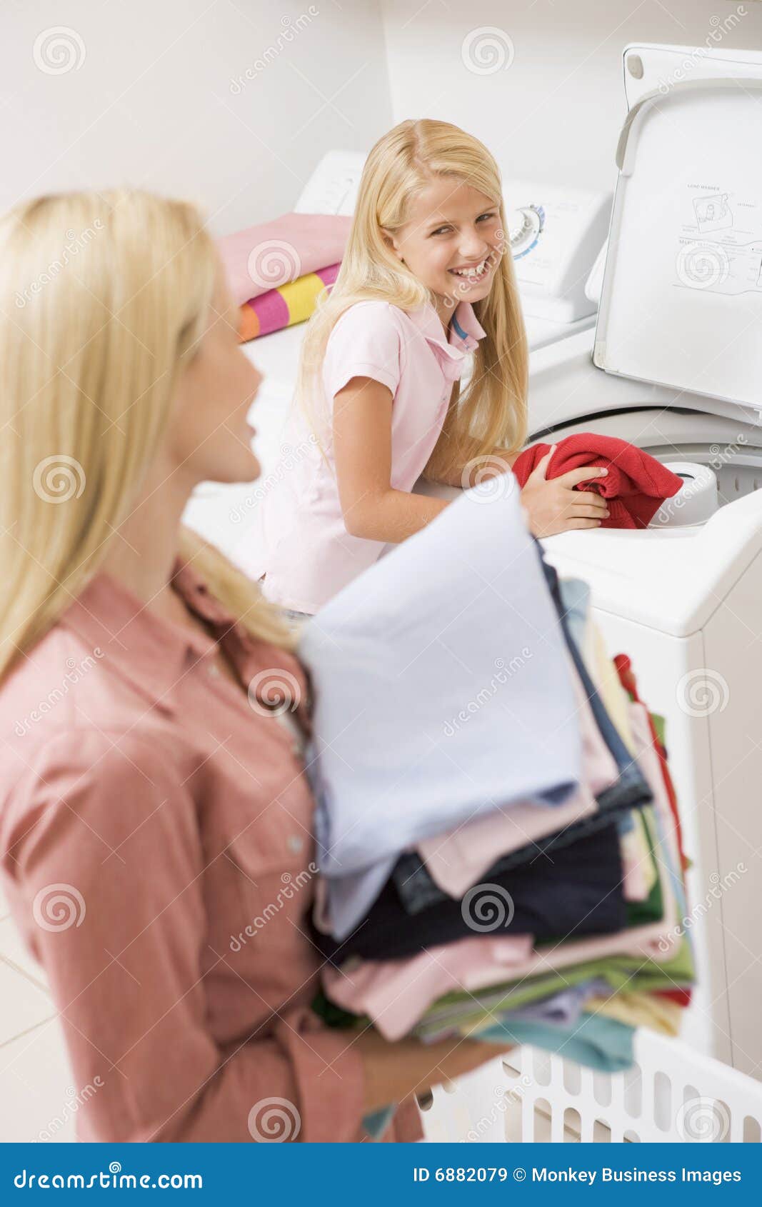 Mother And Daughter Doing Laundry Stock Image Image Of Adolescent