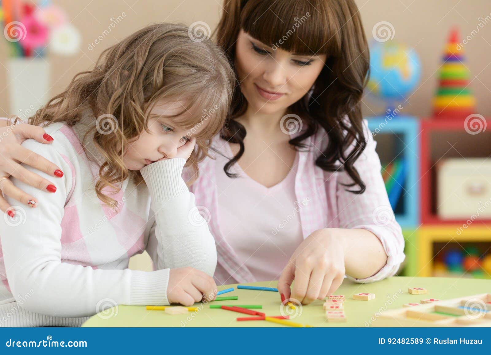 Mother and Daughter Doing Lessons Stock Image - Image of young ...