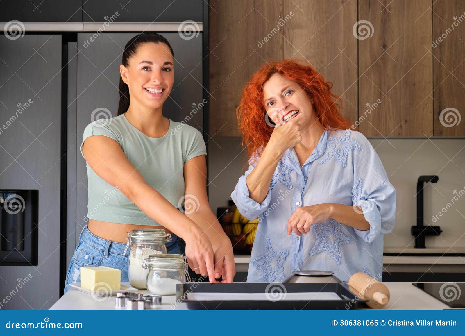 Mother and Daughter Explaining a Cookies Recipe with Sign Language ...