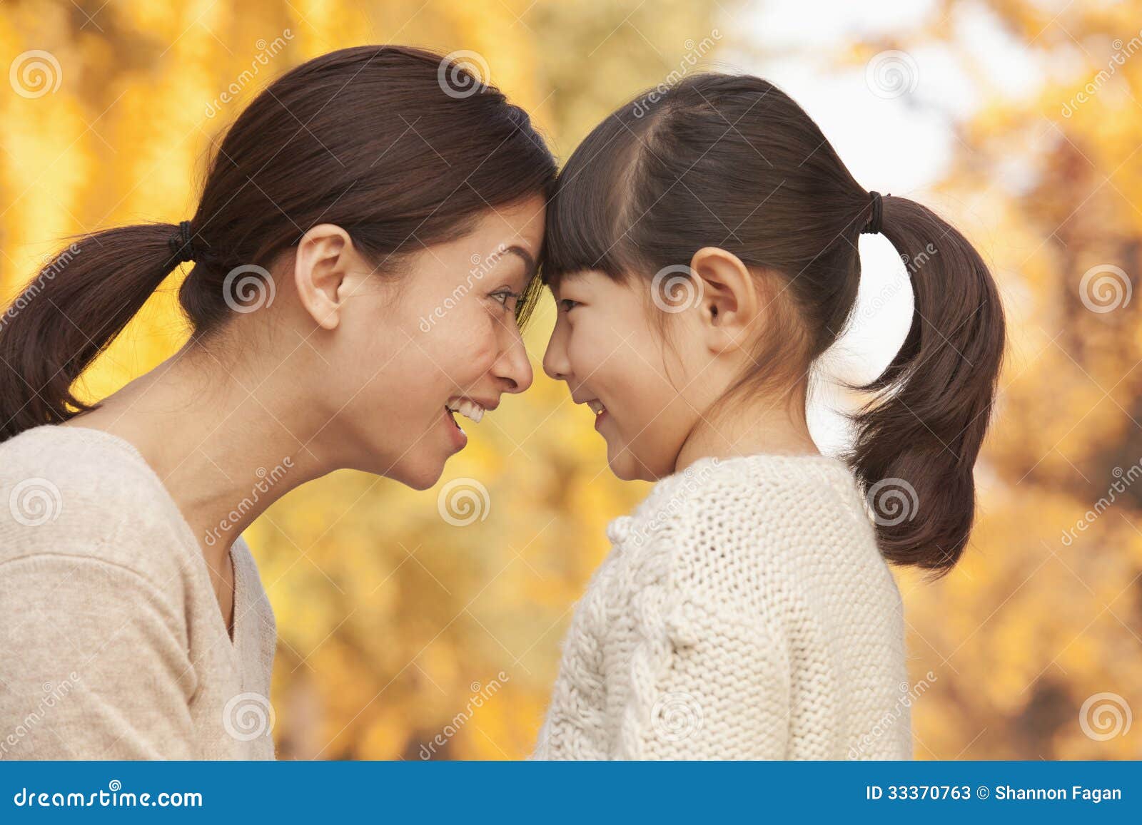 Mother and Daughter Face To Face Stock Image - Image of color ...