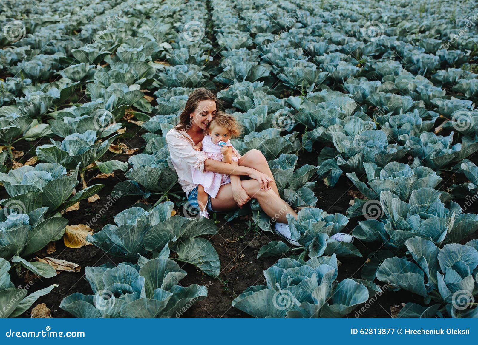 Mother and Daughter on the Field with Cabbage Stock Image - Image of ...
