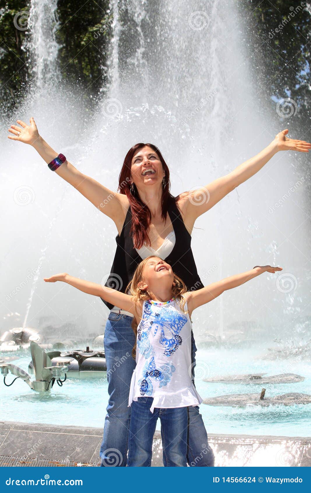 Mother and Daughter by Fountain Stock Photo - Image of bonding ...