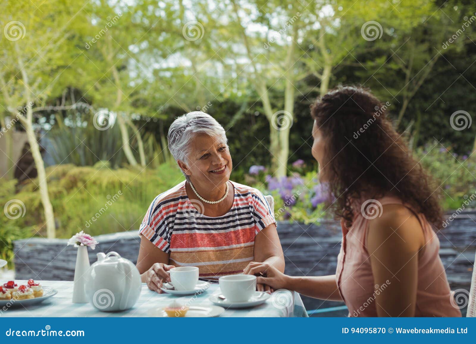 Mother and Daughter Having Tea Stock Photo - Image of leisure, home ...