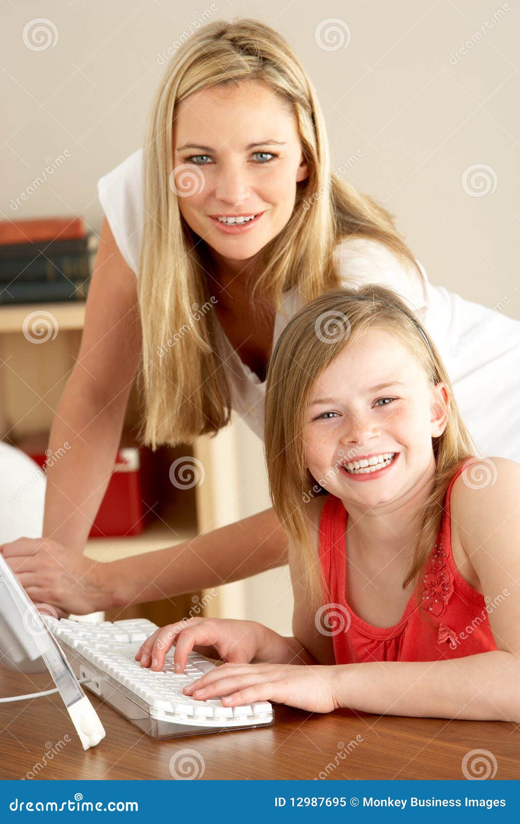 Mother and Daughter at Home Using Computer Stock Image - Image of ...