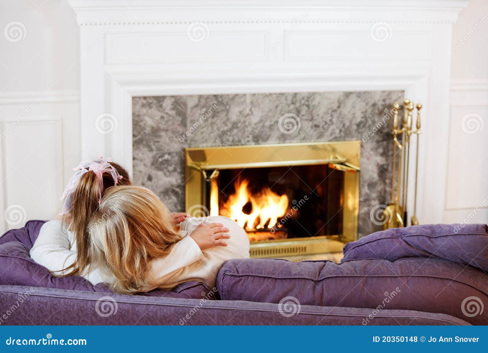 Mother Daughter Hug by the Fire Stock Photo - Image of blond, house ...