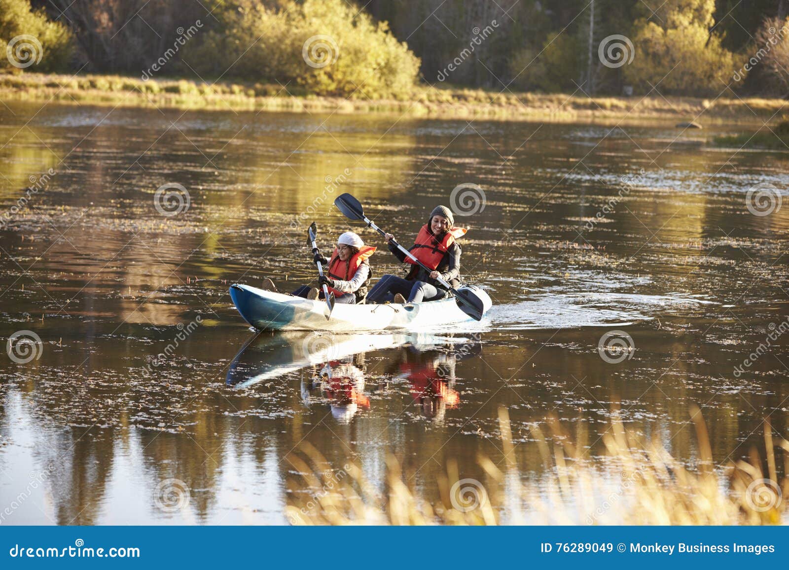 Mother and Daughter Kayaking Together on a Lake, Front View Stock Image ...