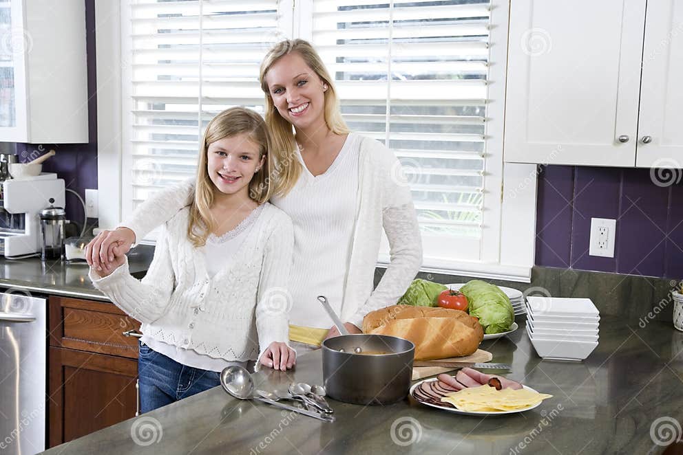 Mother and Daughter in Kitchen Making Lunch Stock Photo - Image of food ...