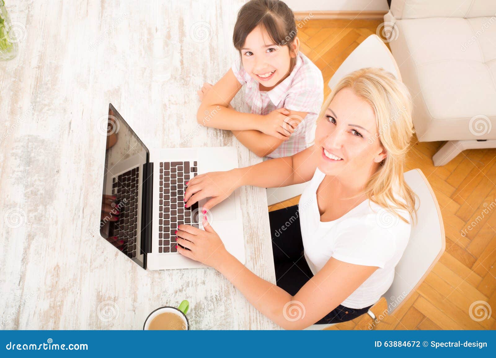 Mother and Daughter with a Laptop at Home Stock Photo - Image of ...