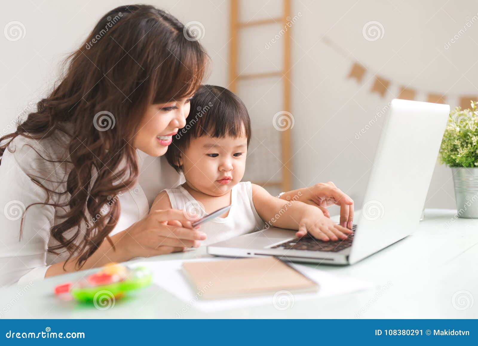 Mother and Daughter are Learning To Write. Stock Image - Image of ...