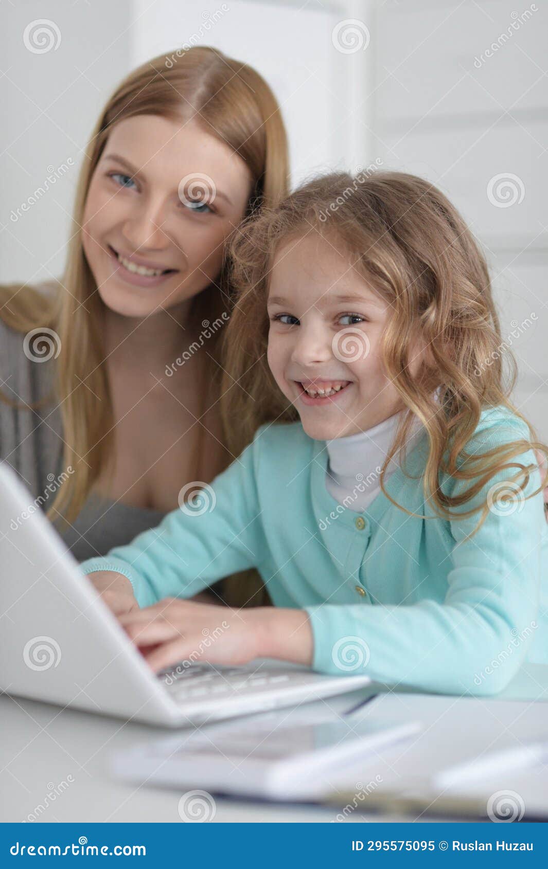 Mother and Daughter Looking at Laptop Computer Stock Image - Image of ...