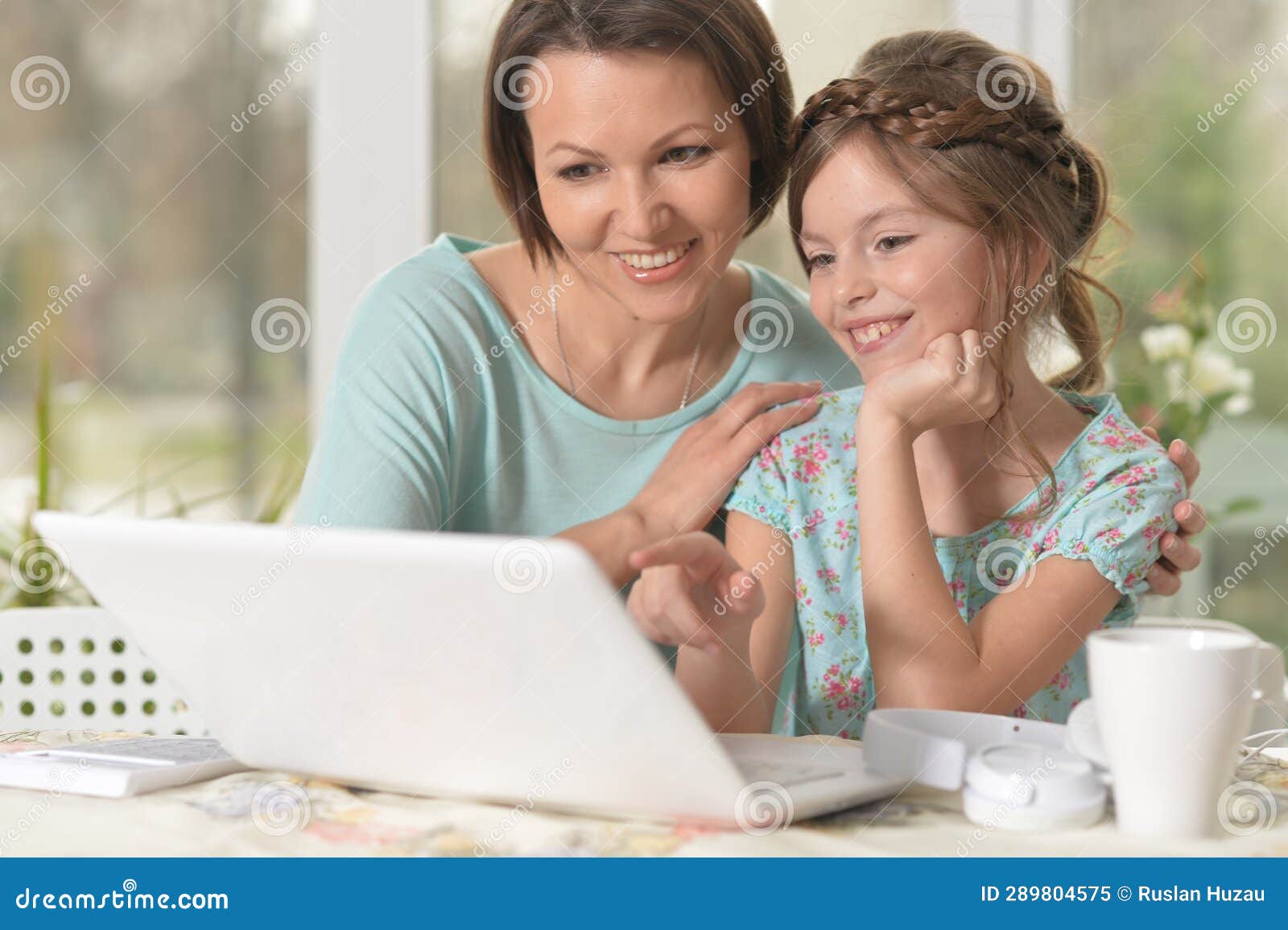 Mother and Daughter Looking at Laptop Computer Stock Image - Image of ...