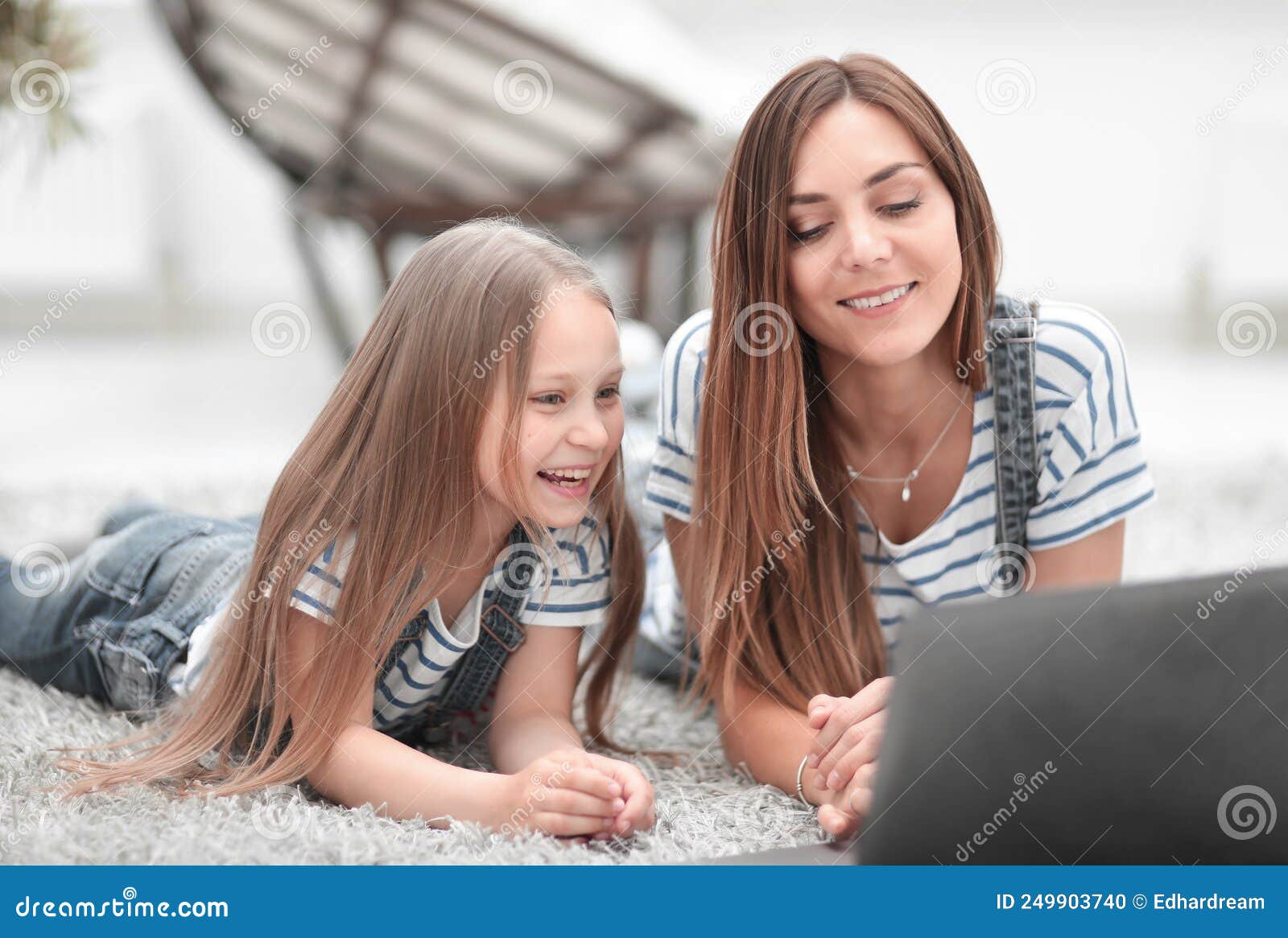 Mother and Daughter Looking at the Laptop Screen. Stock Photo - Image ...
