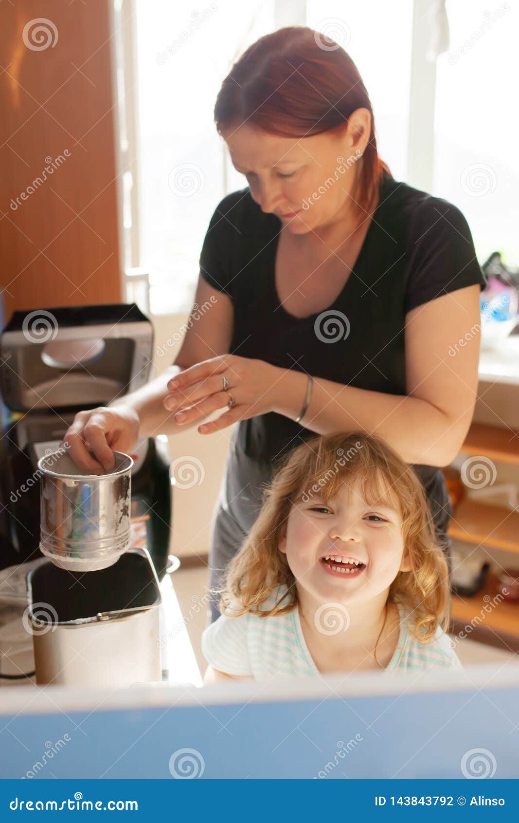 Mother and Daughter Making Bread Together at Home Kitchen Stock Photo ...