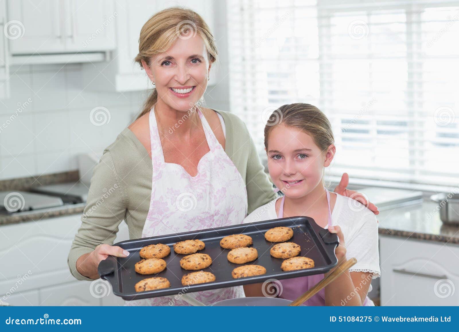 Mother and Daughter Making Cookies Together Stock Image - Image of ...