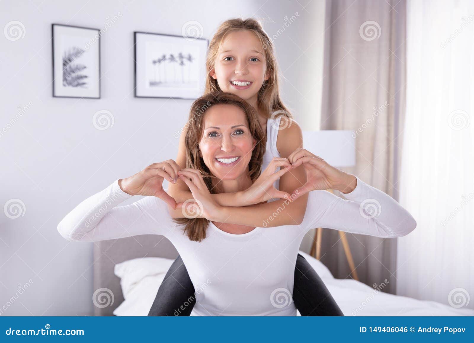 Mother and Daughter Making Heart Shape Stock Photo - Image of beauty ...