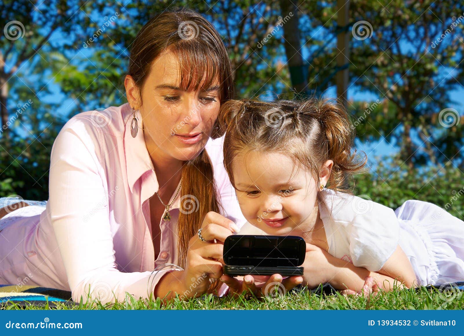 Mother and Daughter with Mobile Phone Stock Photo - Image of cute ...
