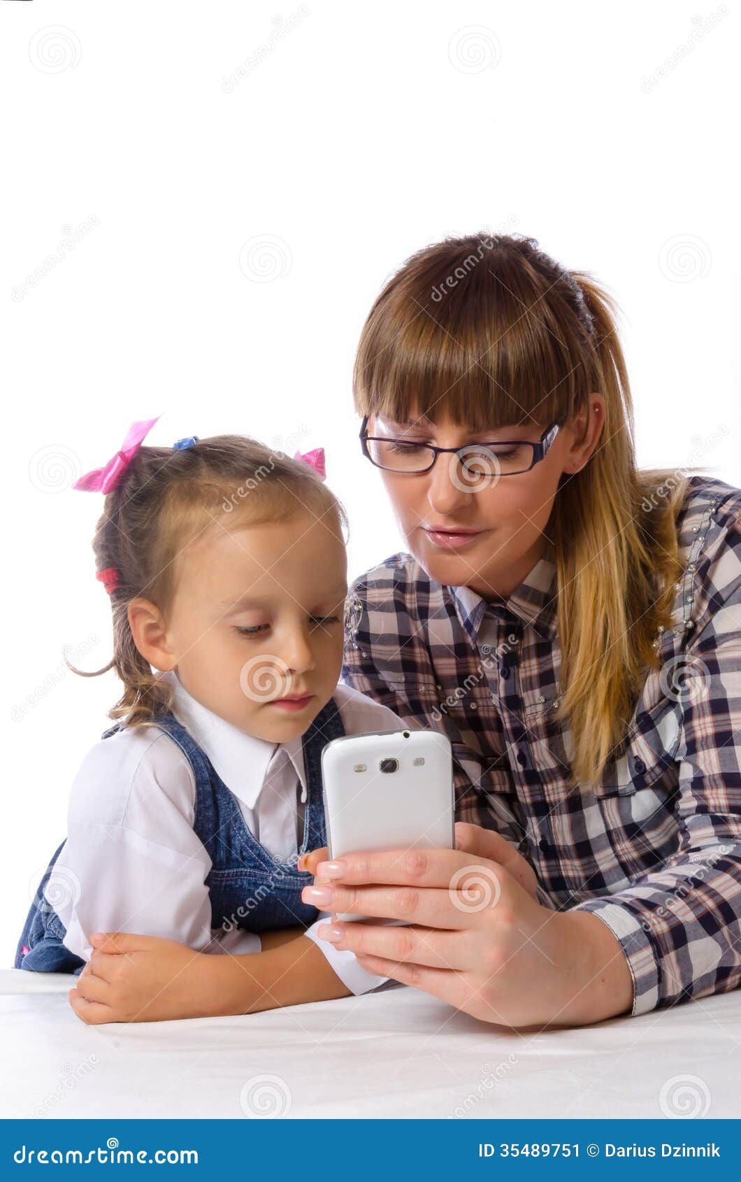 Mother and Daughter with Mobile Phone Stock Image - Image of laptop ...