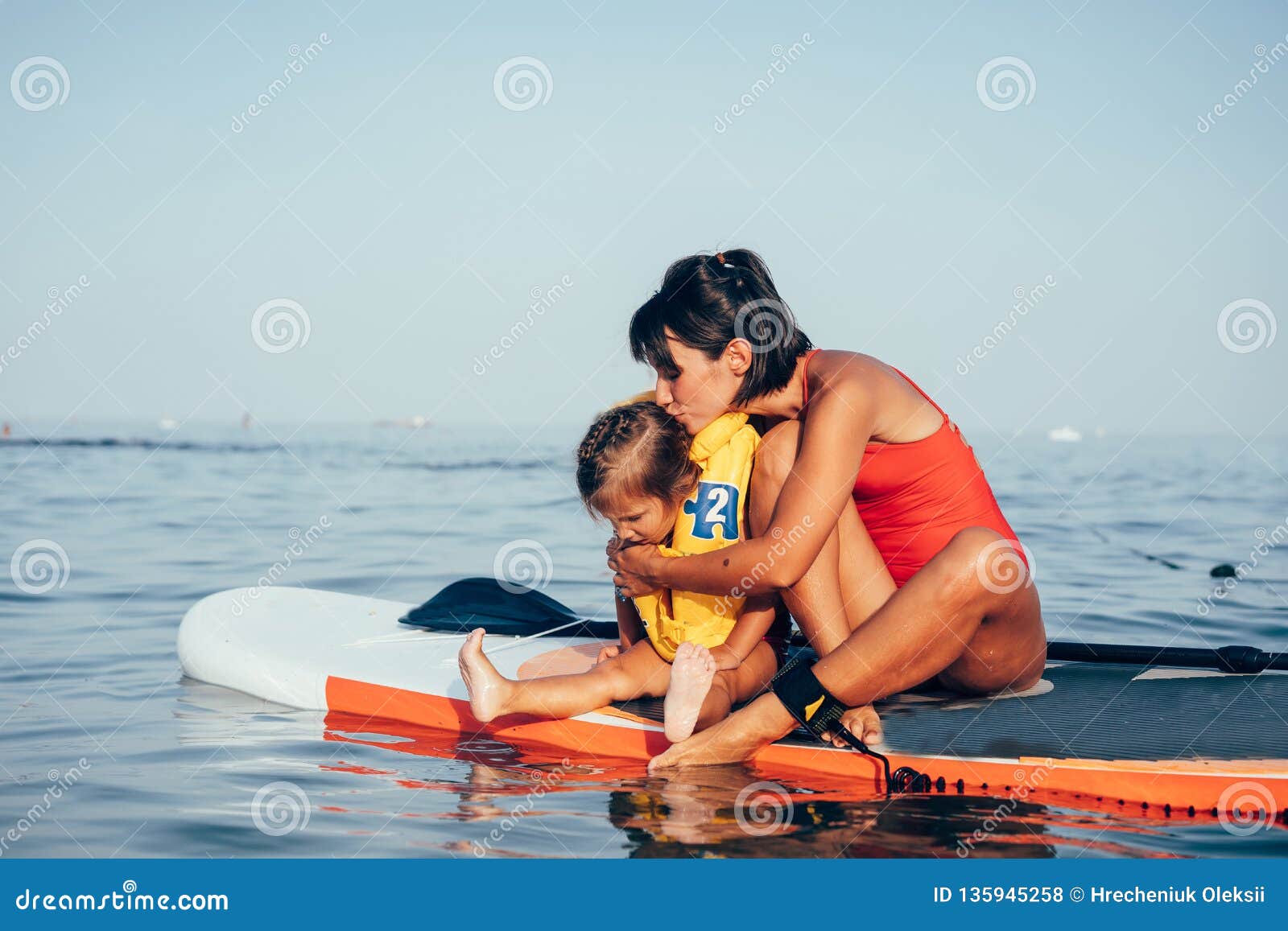 Mother with Daughter on a Paddle Board Stock Photo - Image of mama ... Mother with Daughter on a Paddle Board Stock Photo - Image of mama ...